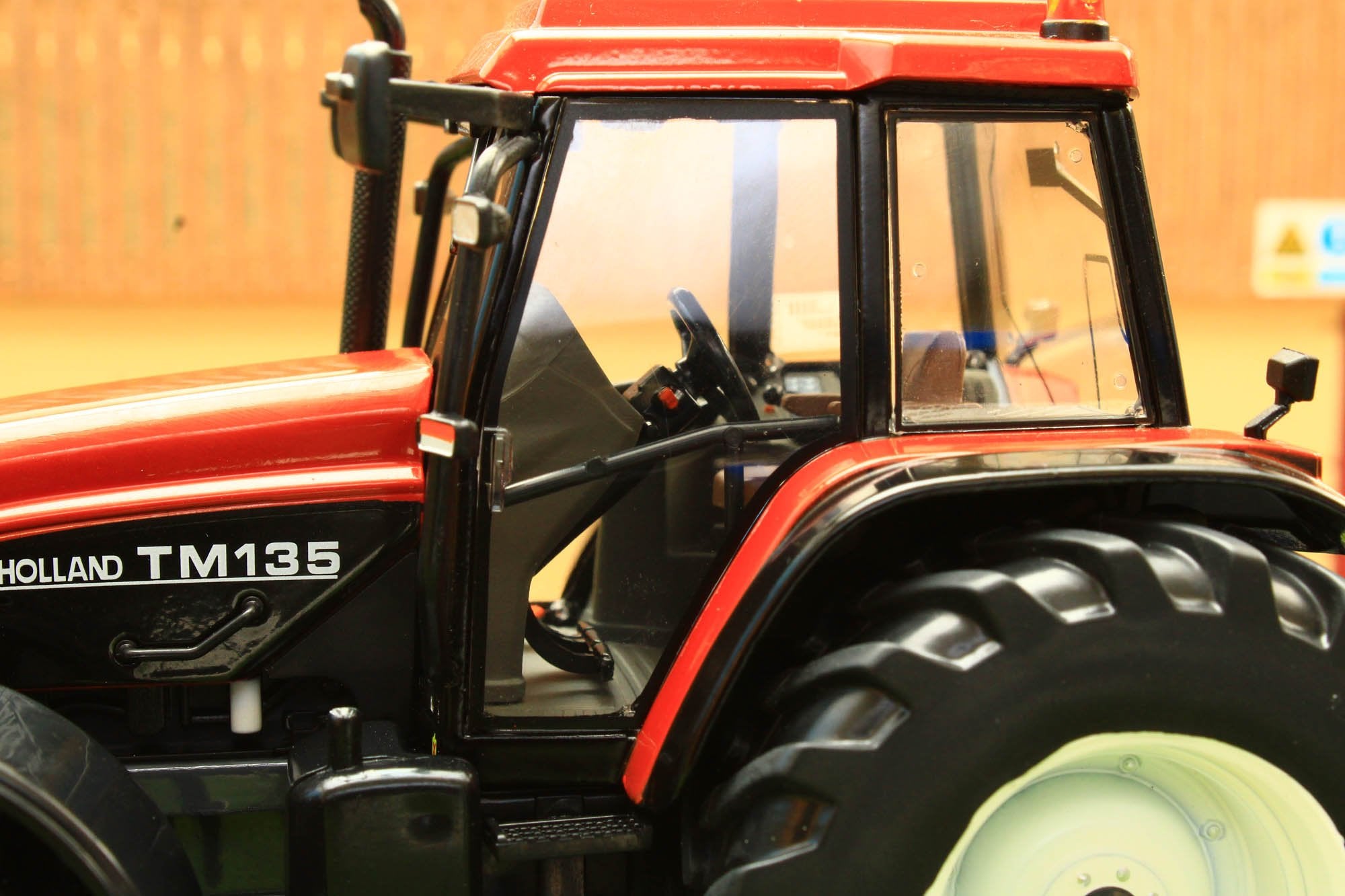 REP221 REPLICAGRI NEW HOLLAND TM135 TRACTOR IN TERRACOTA – Brushwood Toys