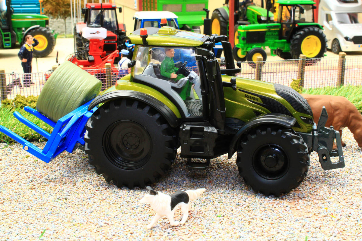 43323 Britains Olive Green Valtra Playset inc. Bale Lifter and Cow Fee ...