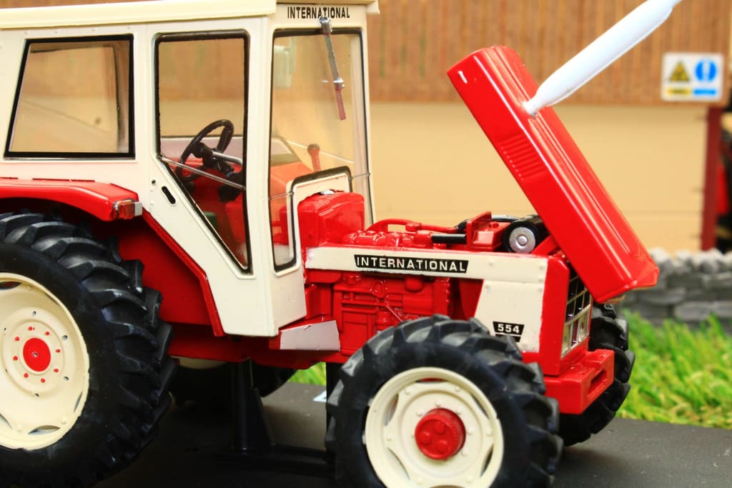 REP199 Replicagri International IH 554 4WD Tractor – Brushwood Toys